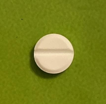 Pill Finder: L 16 White Round - Medicine.com
