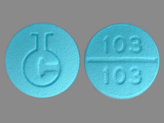 Pill Finder: 103 103 Logo Blue Round - Medicine.com